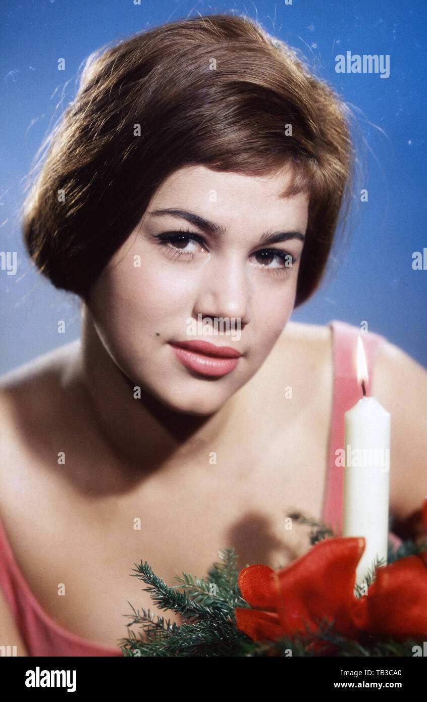 Woman candle 1960s hi-res stock photography and images - Alamy