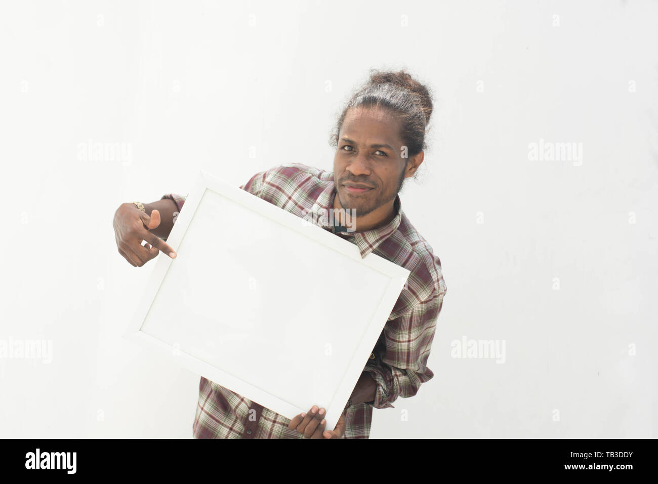 young black man pointing white board with isolated background in white ...