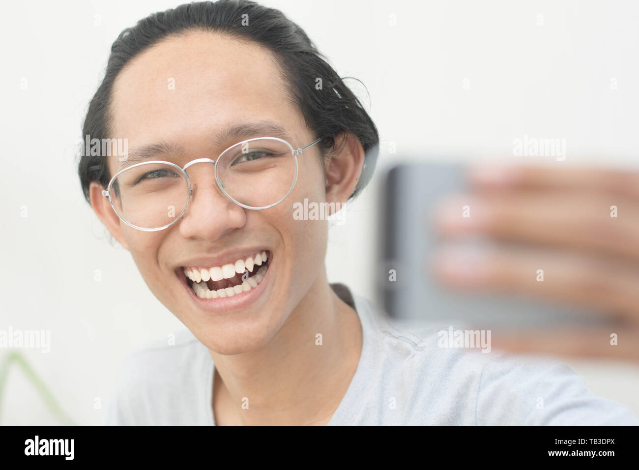 Take pictures of himself hi-res stock photography and images - Alamy