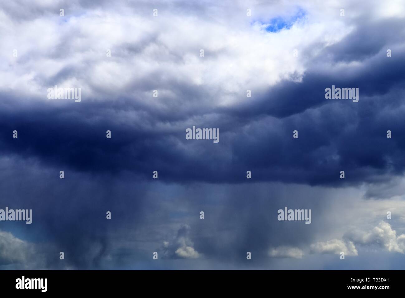Dark clouds forming in the sky right before a thunderstorm Stock Photo ...