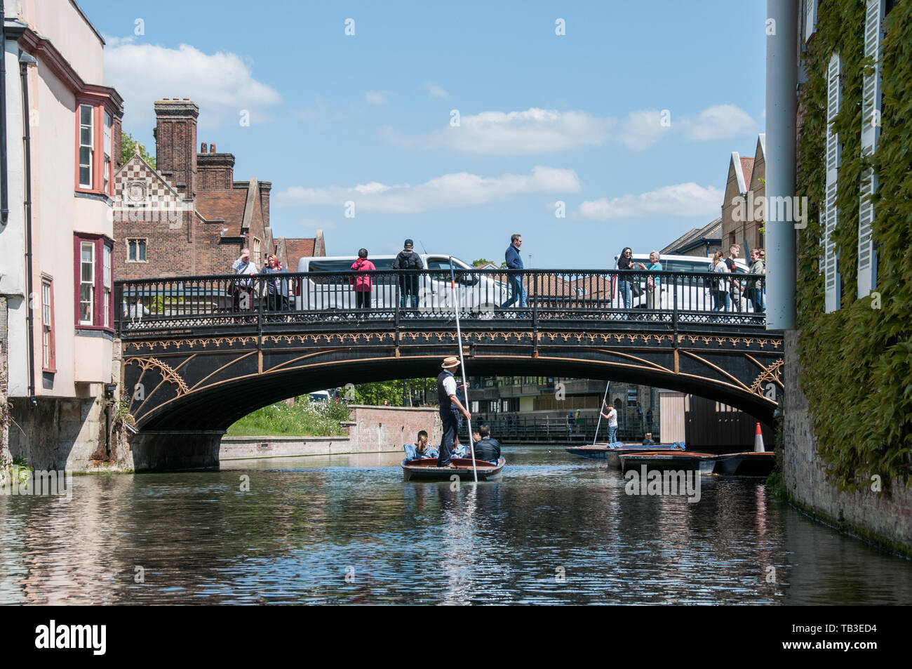 Around the UK - punting on the River Cam, passing under Magdalene ...