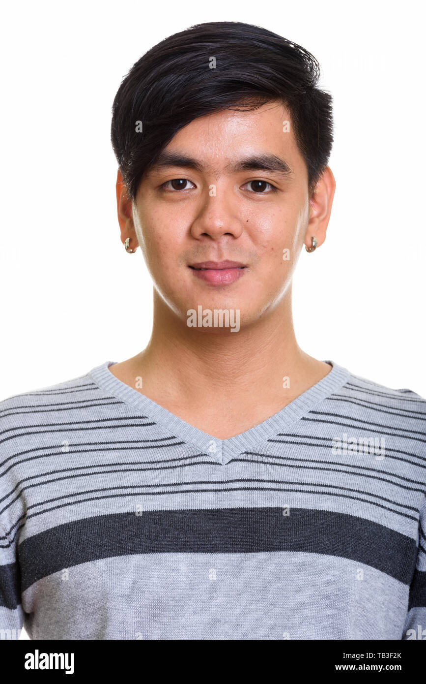 Face of handsome Asian man against white background Stock Photo - Alamy