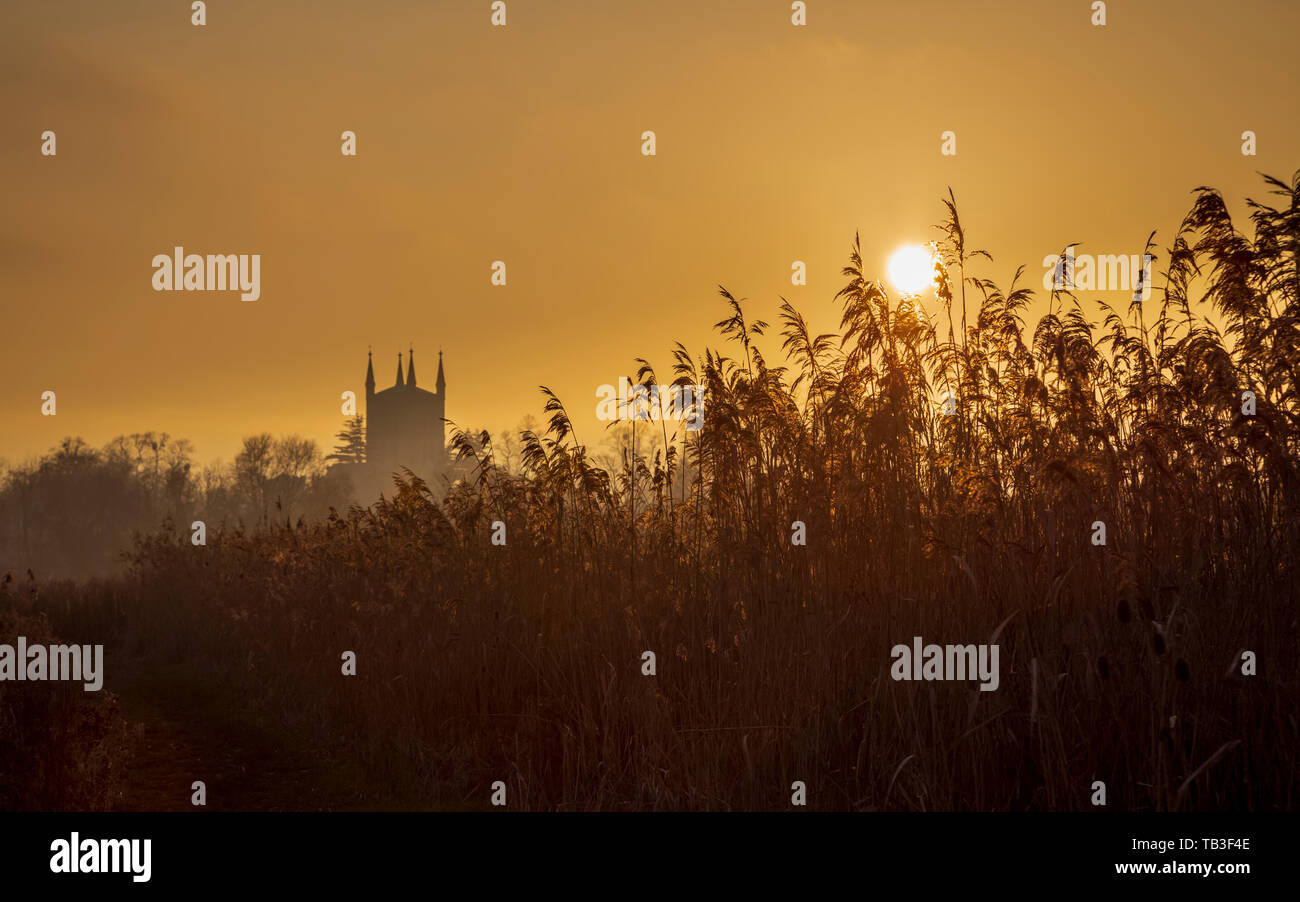 A winters view of Pershore Abbey across Avon Meadows Wetland Reserve ...