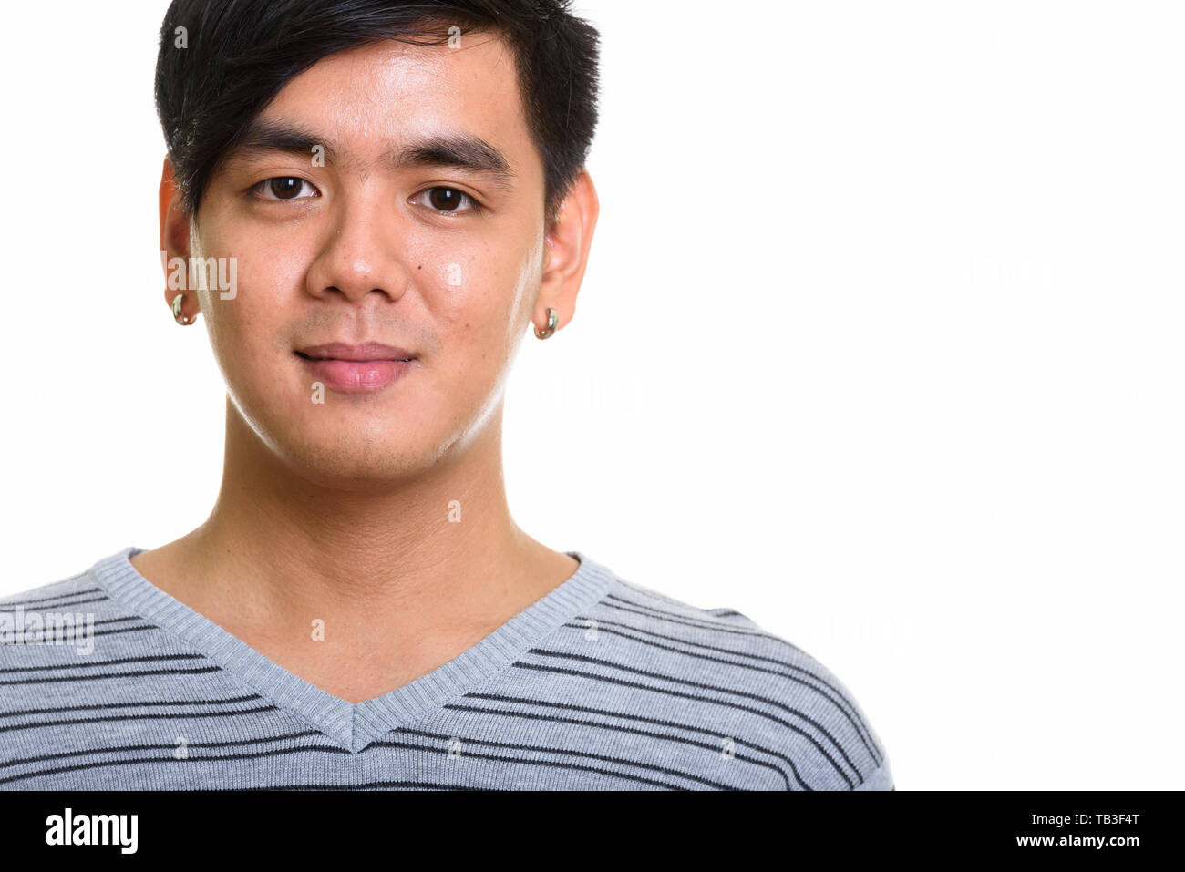 Close up of handsome Asian man against white background Stock Photo - Alamy