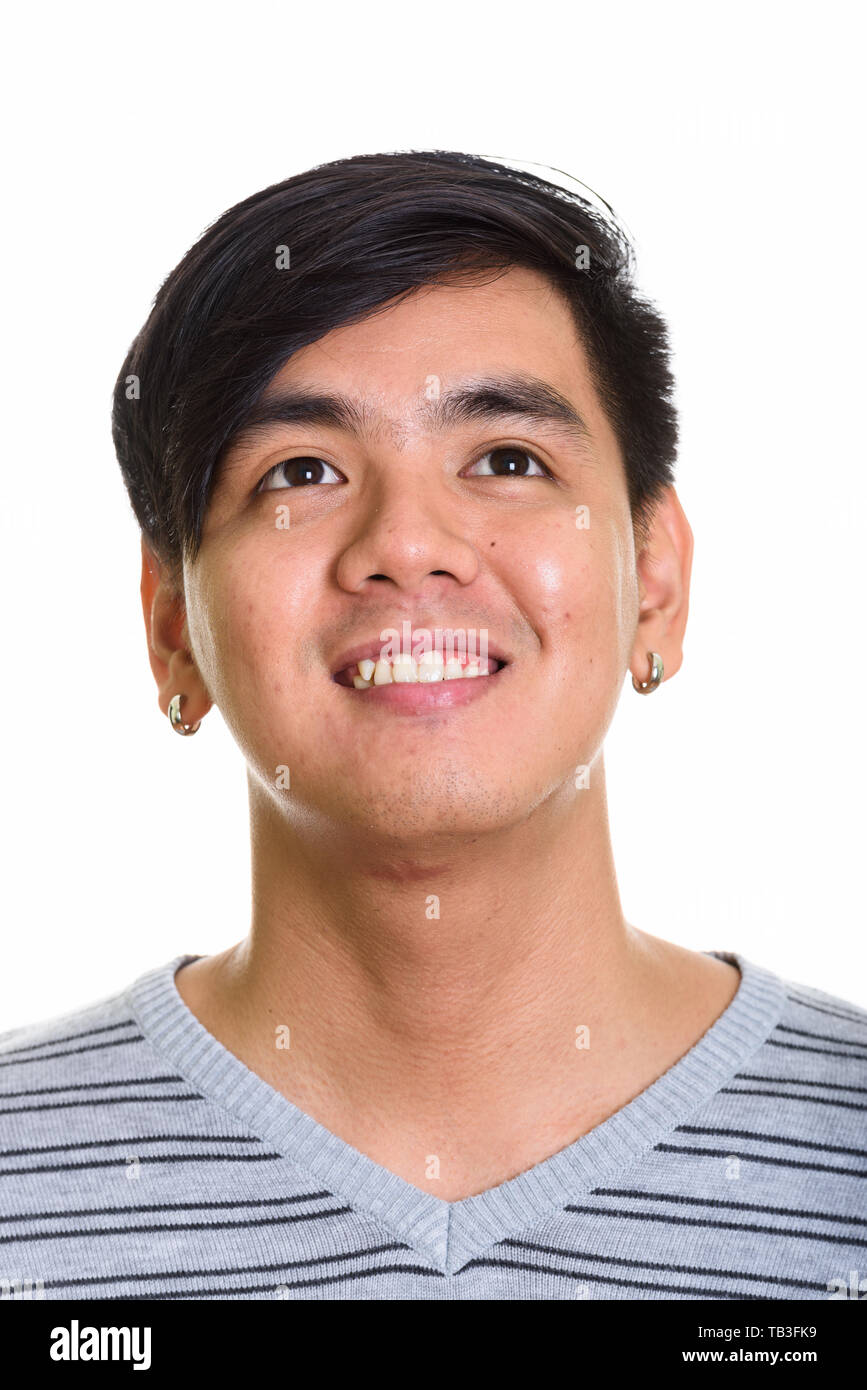 Studio shot of handsome Filipino man against white background Stock ...