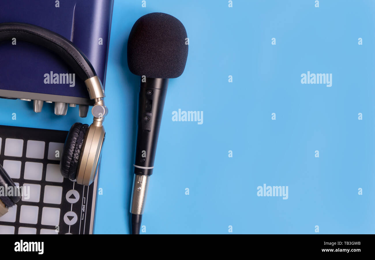 Music recording equipment on blue copy space Stock Photo - Alamy