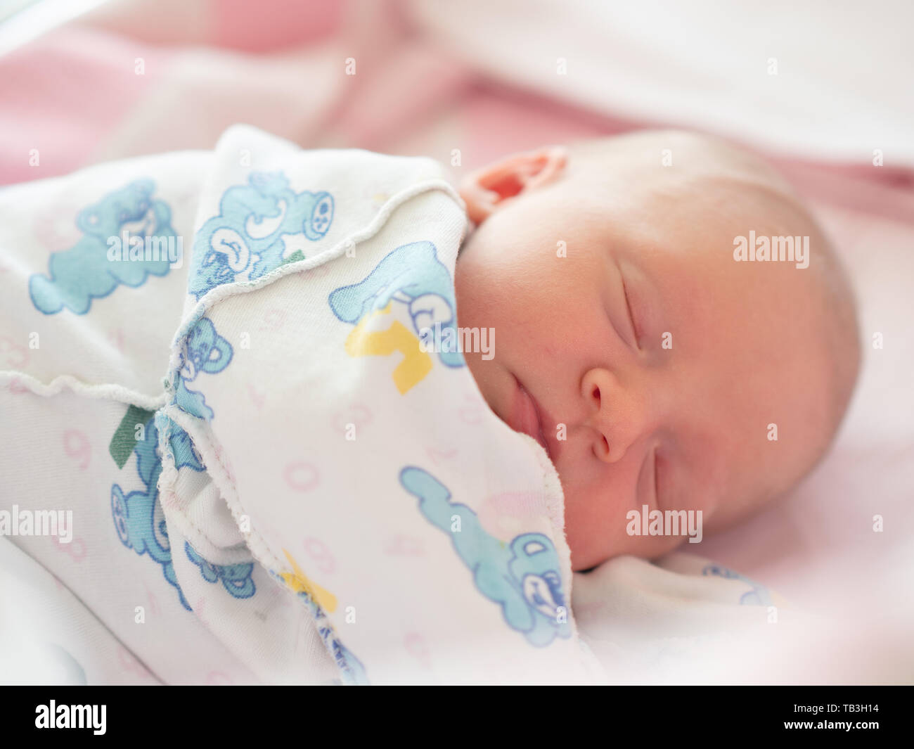 Sleeping newborn baby Stock Photo - Alamy