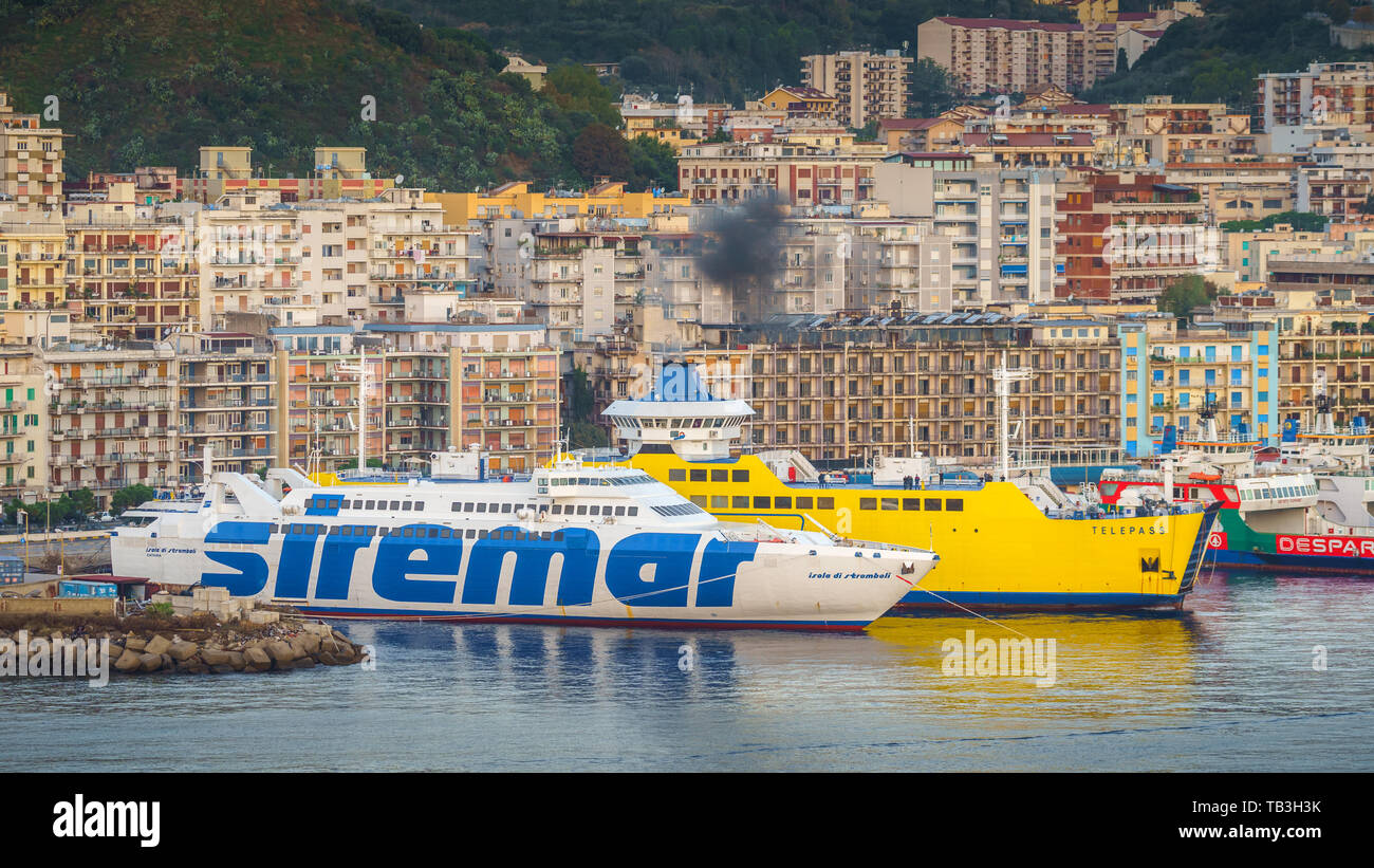 The buildings on the side of the port in Sicily where big ferry ships ...