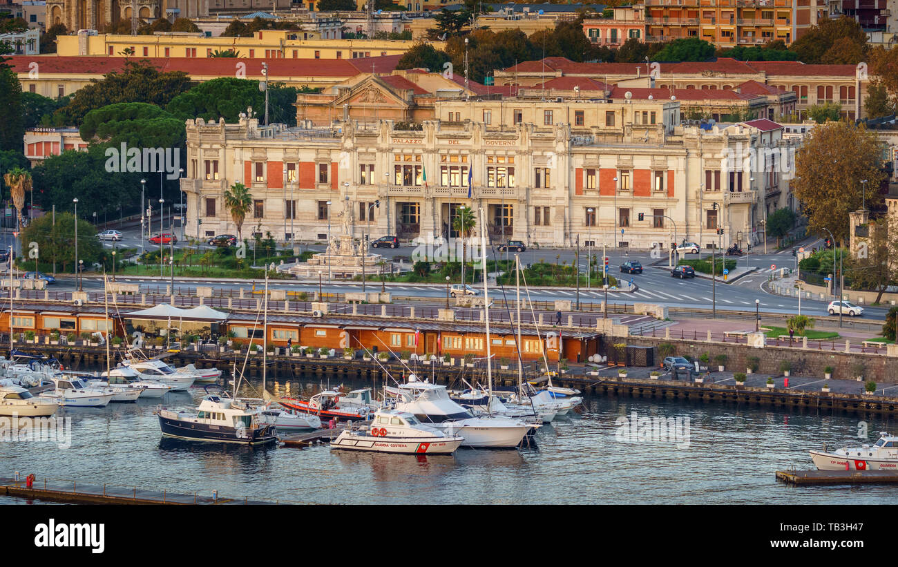 The buildings on the side of the port in Sicily where big ferry ships ...
