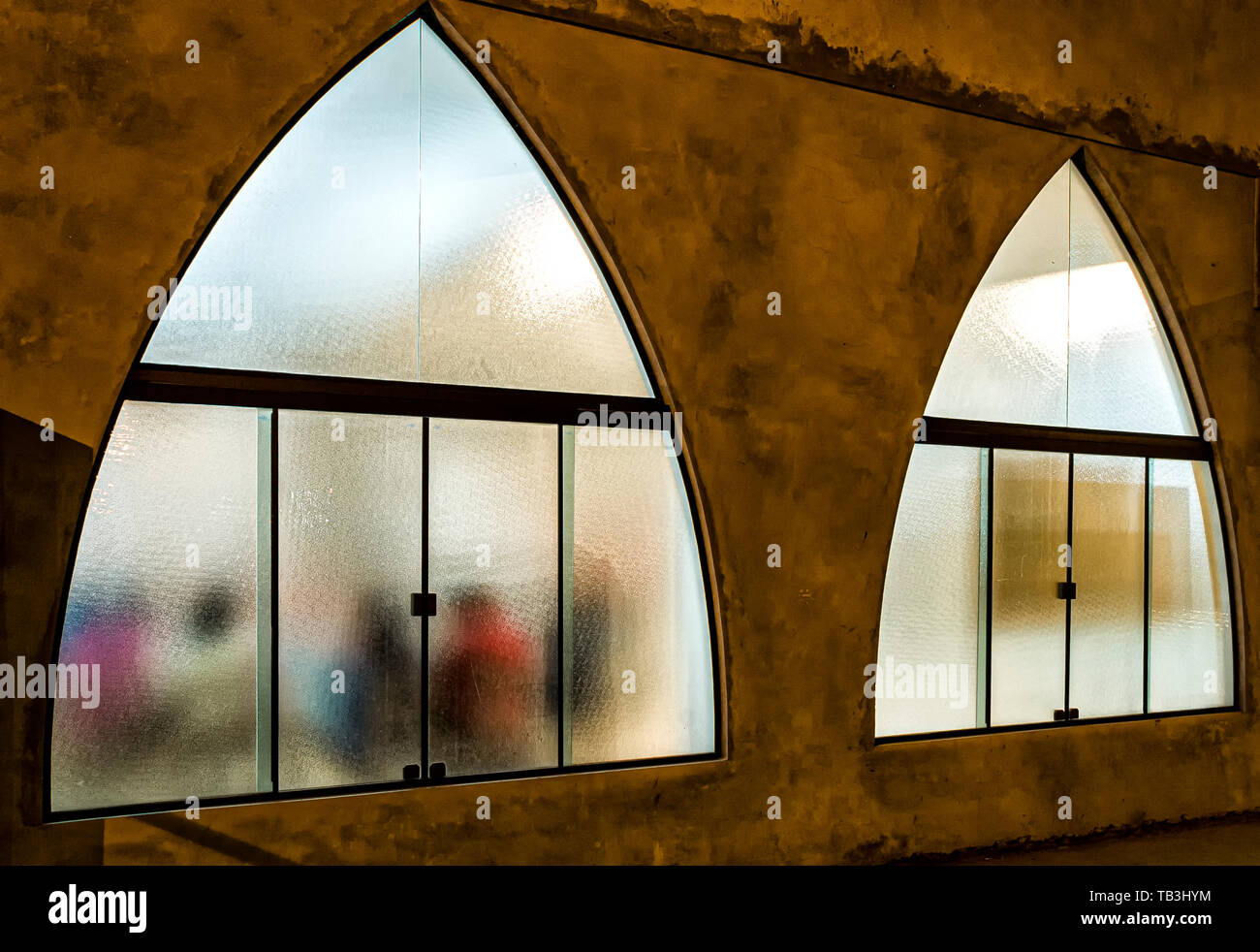 People through window night hi-res stock photography and images - Alamy