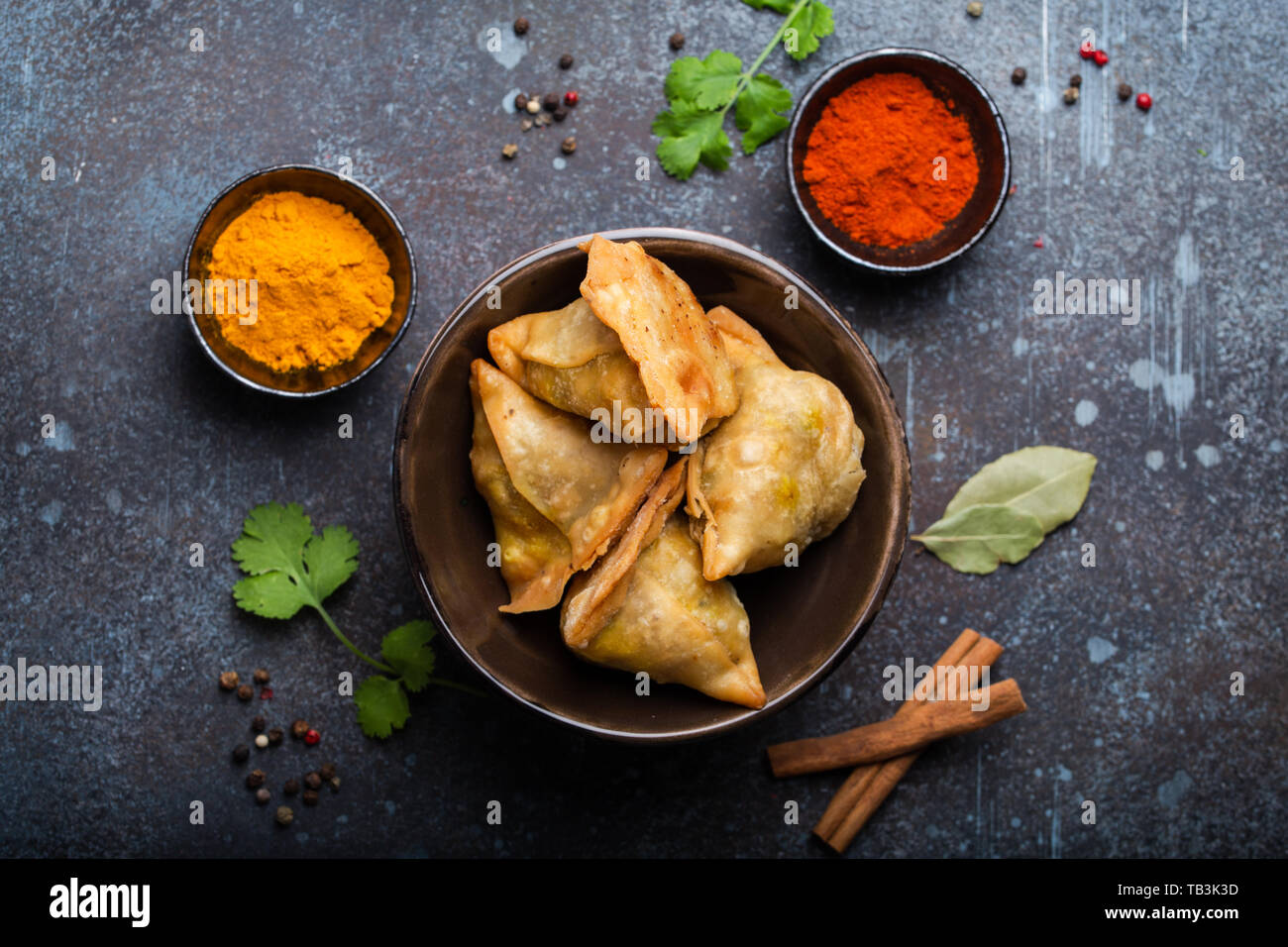 Indian baked stuffed pastry samosa Stock Photo - Alamy
