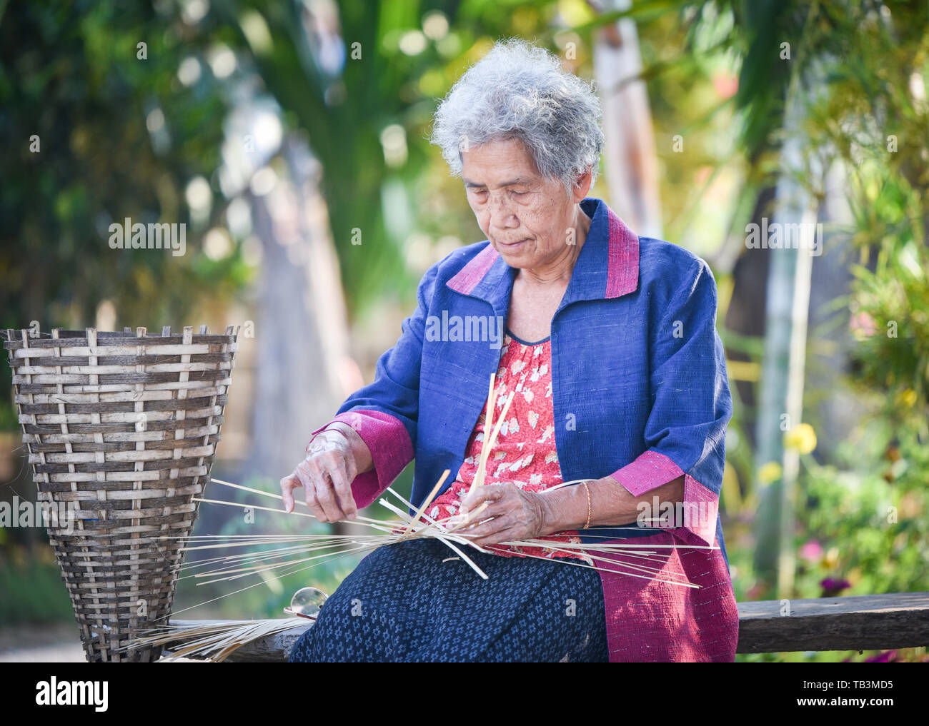 Asia life old woman working in home / Grandmother serious living in the ...