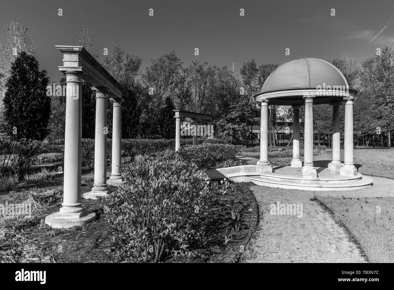 Garden featuring Arch with columns Stock Photo - Alamy
