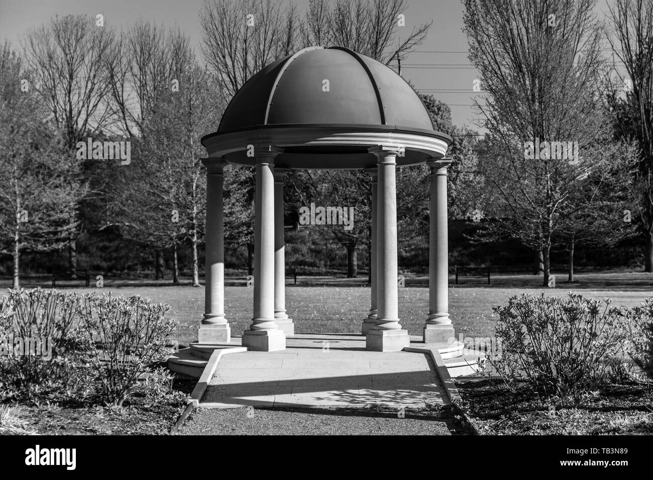 Garden featuring Arch with columns Stock Photo - Alamy