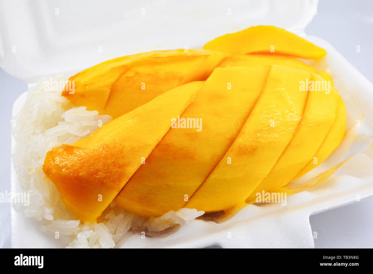 Mango sticky rice with coconut milk thai dessert Stock Photo - Alamy