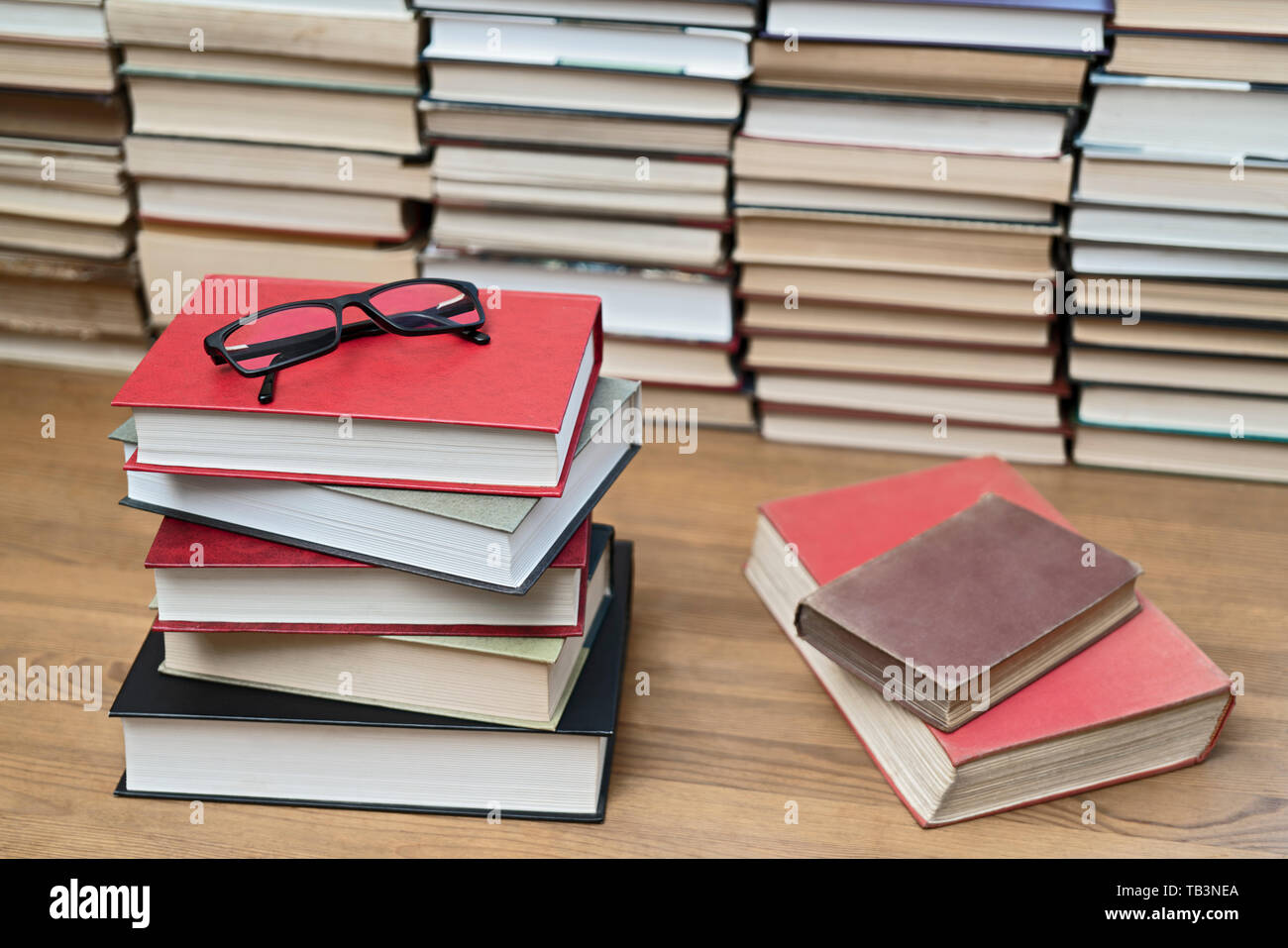 Glasses on the background of books. Symbol of knowledge, science, study ...