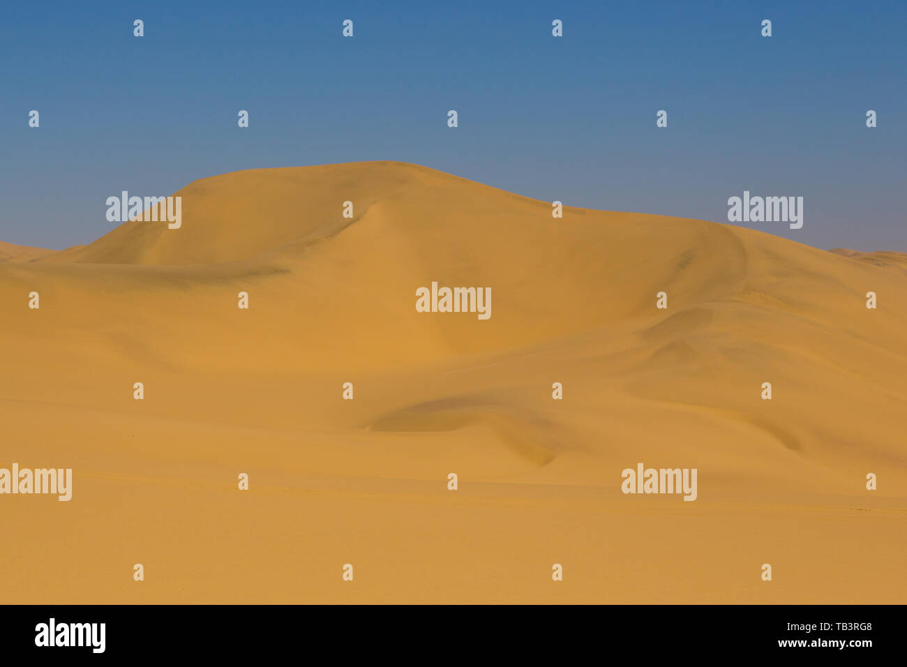 natural tall sand dune in Namib desert, blue sky Stock Photo - Alamy