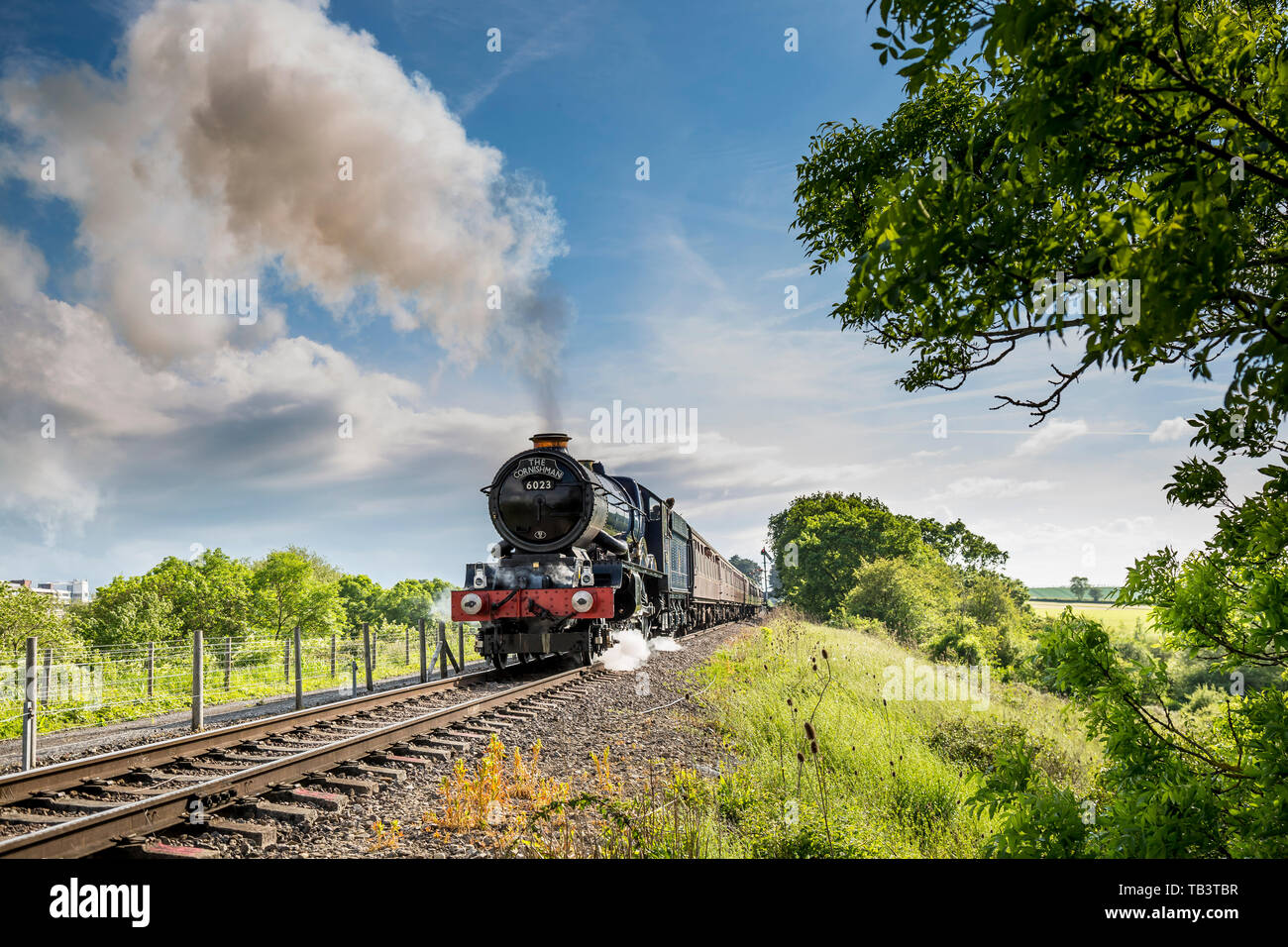 Vintage UK steam locomotive King Edward II approaching on railway track ...