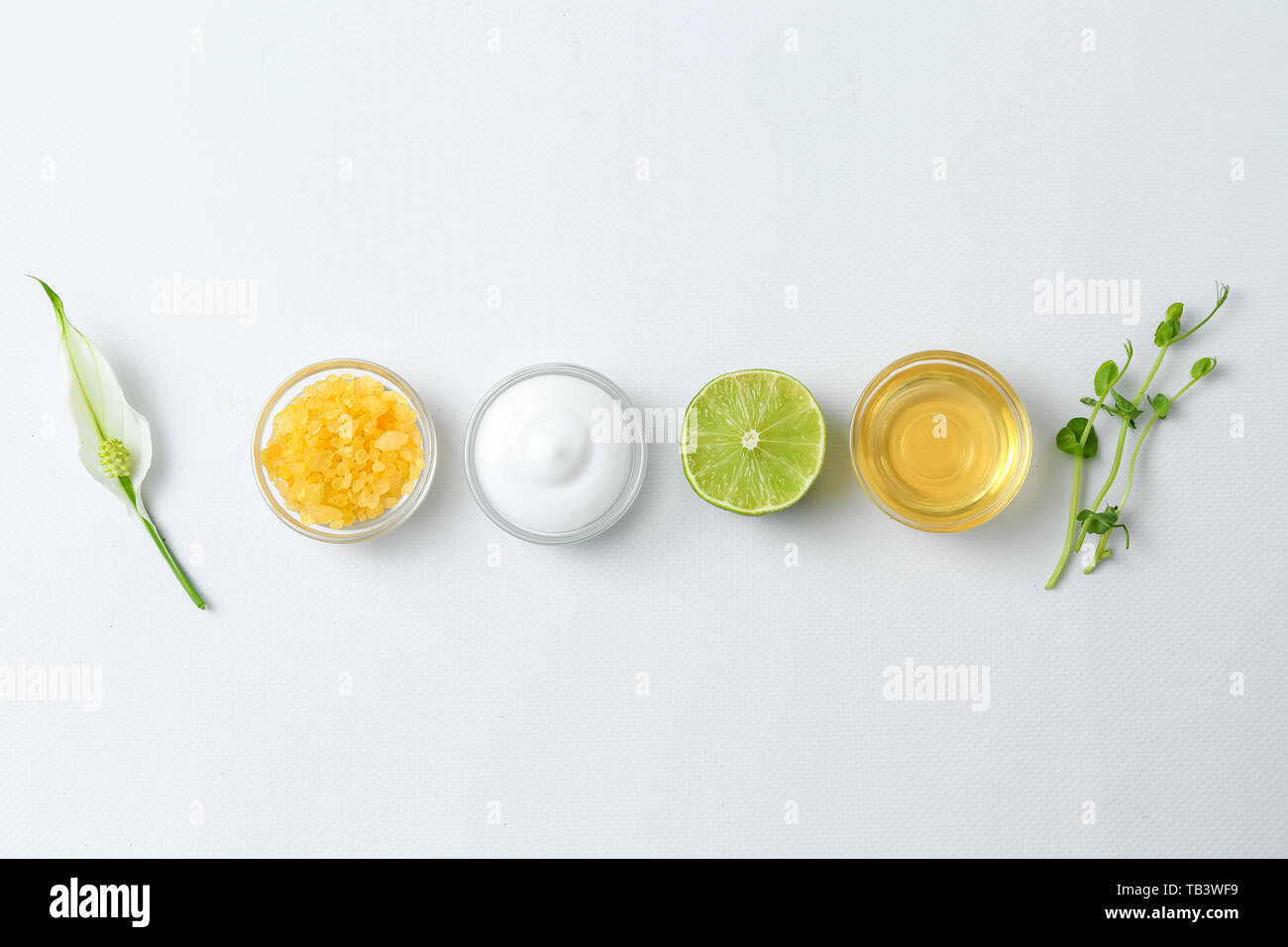 Natural ingredients for cosmetic on white background Stock Photo - Alamy