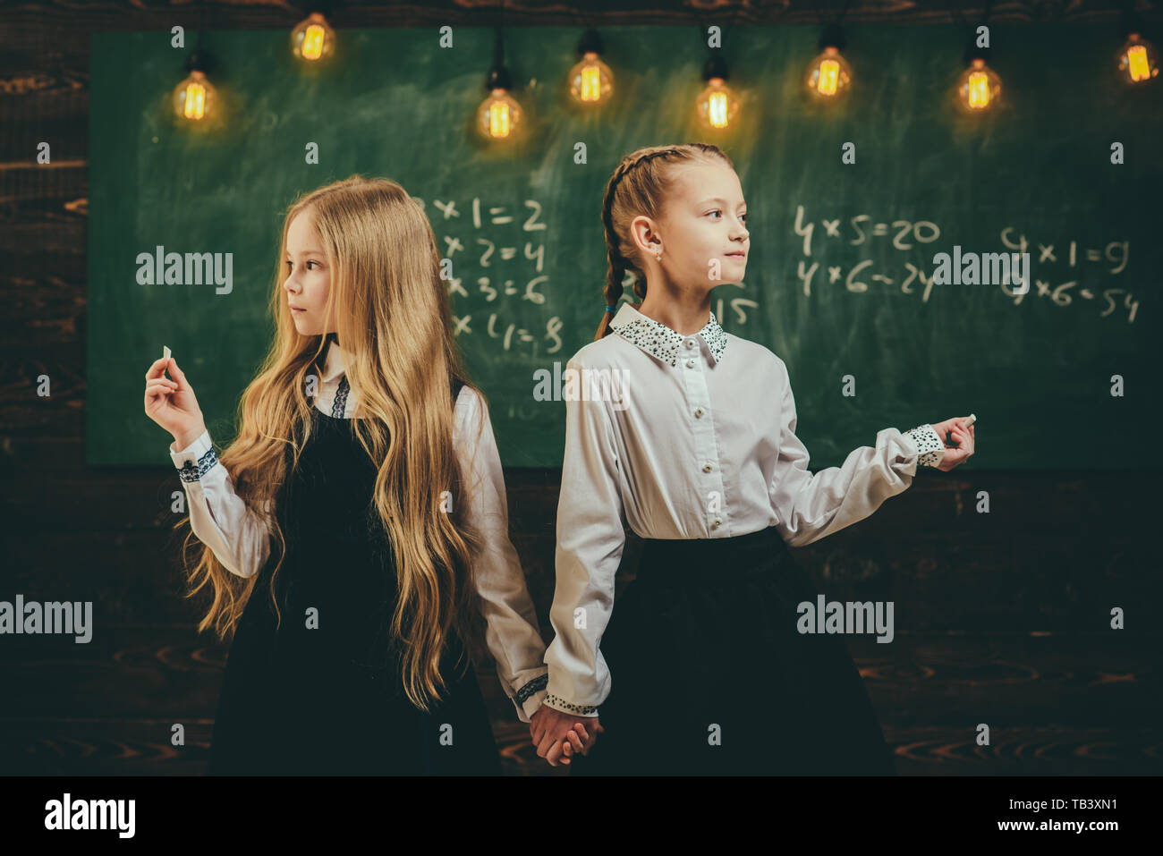 more knowledge. small girl get knowledge at school. knowledge day ...