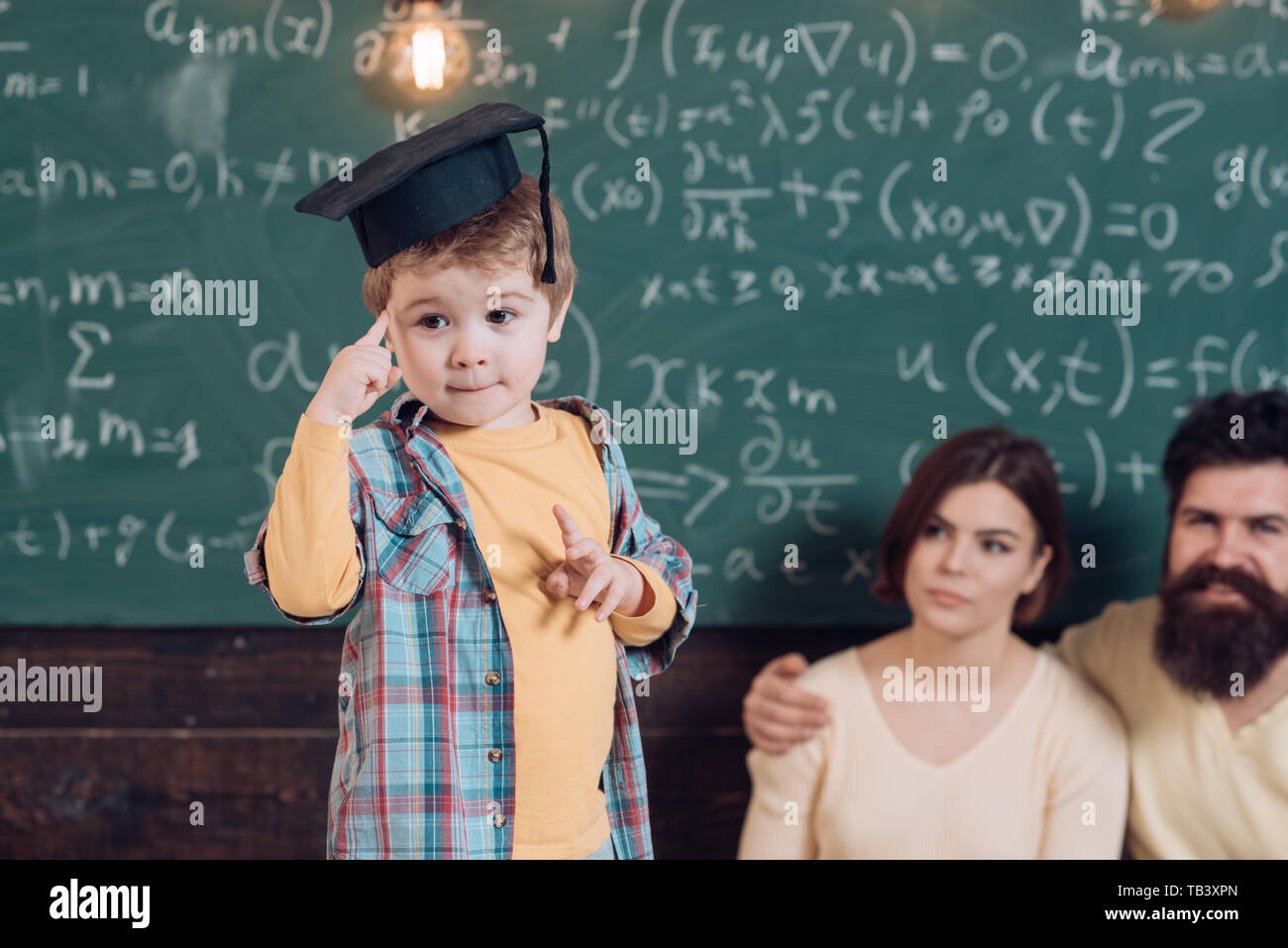 Examination and exam. Little boy think on examination question. Child ...