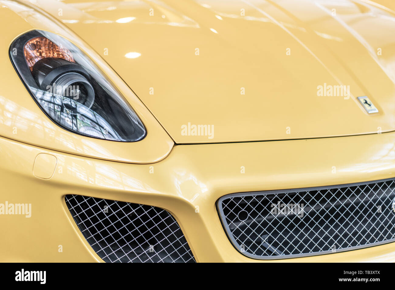 Prague, Czech republic - 16/5/2019 Yellow Ferrari headlights at auto ...