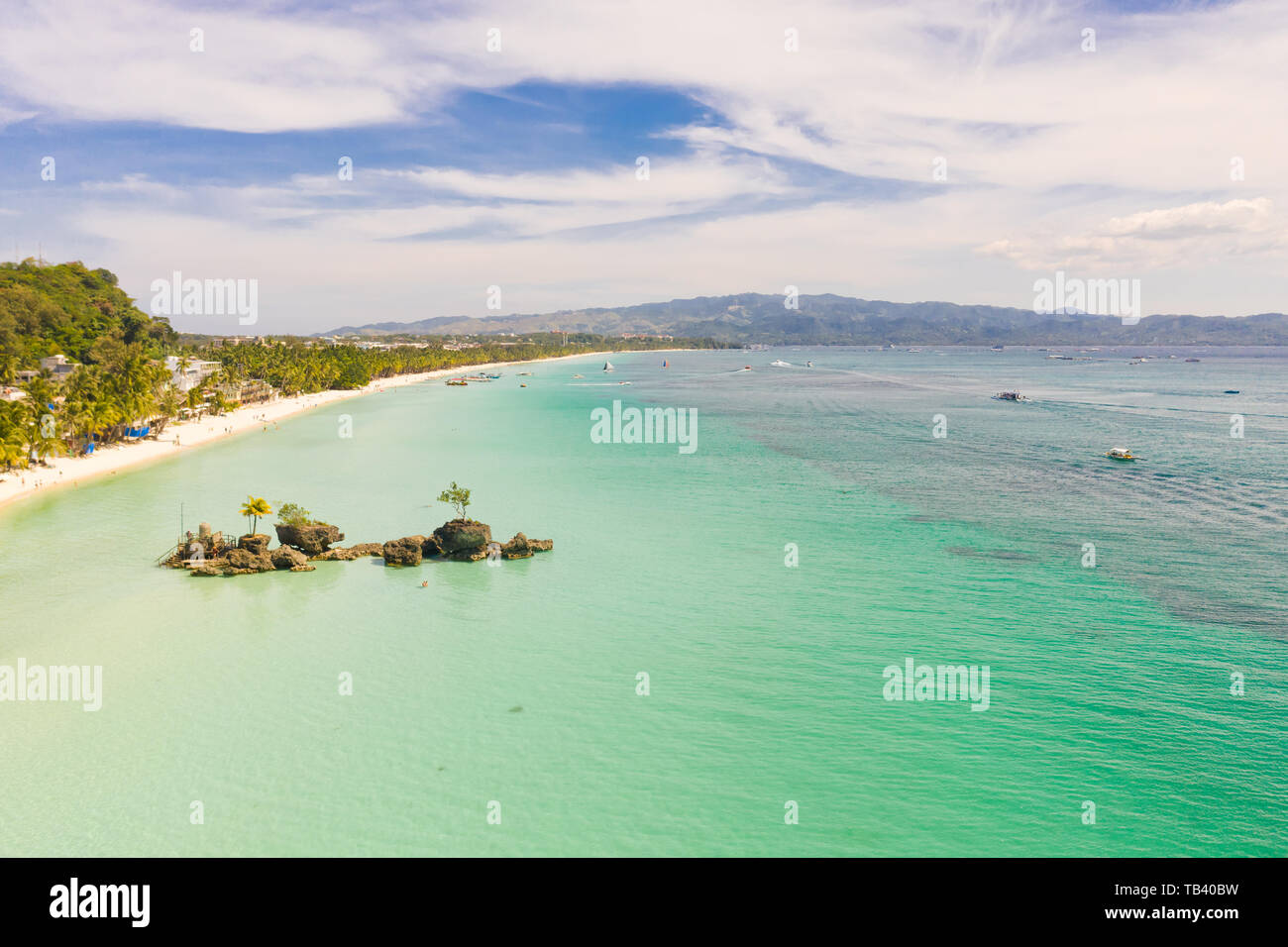 White sand beach and lagoon with turquoise water, aerial view. Coast of ...