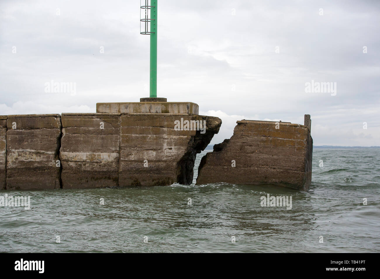 Storm damage to the sea wall in Amble, Northumberland, UK Stock Photo ...