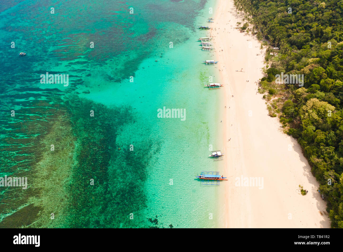 Puka Shell Beach. Wide tropical beach with white sand. Beautiful white ...