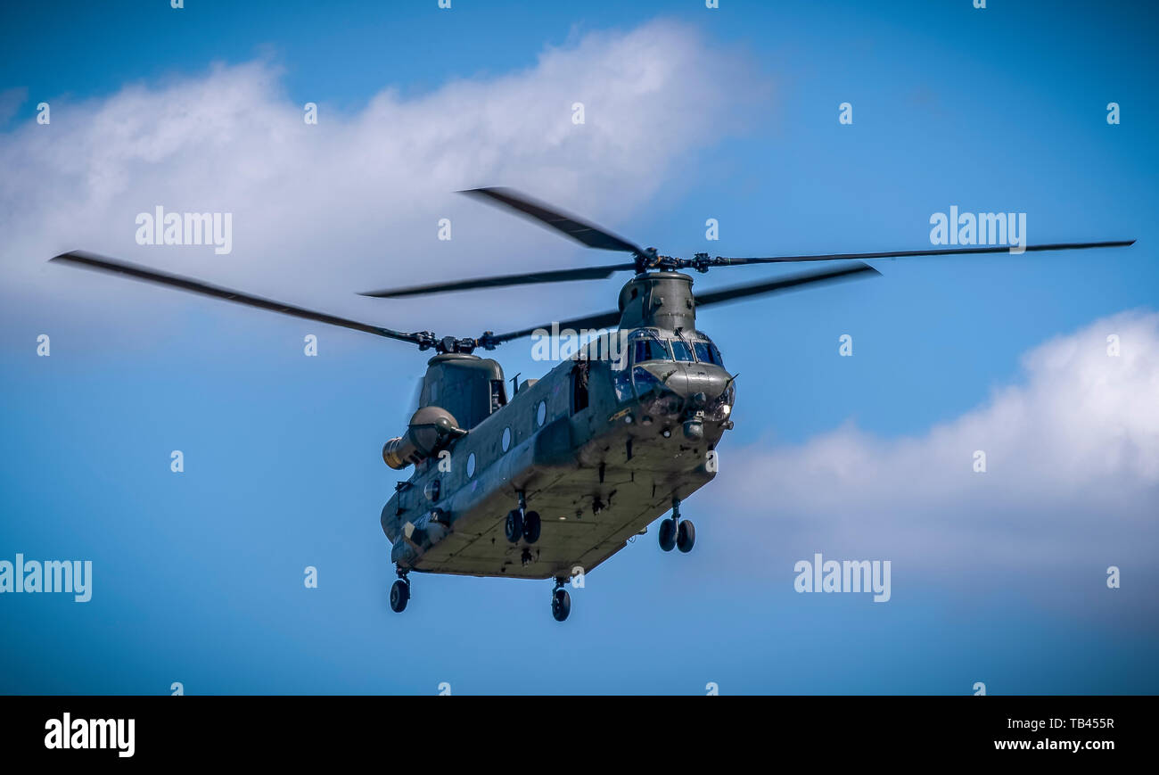 RAF Chinook Helicopter in Flight with blurred blades at the Duxford Air ...