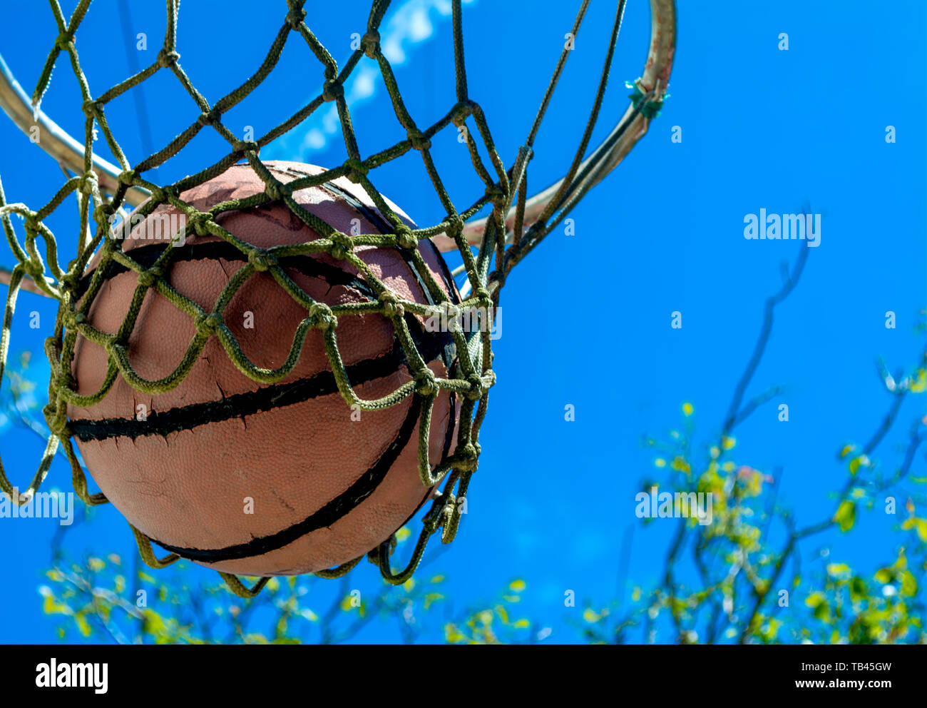 ball inside the basket in an old country playground Stock Photo - Alamy