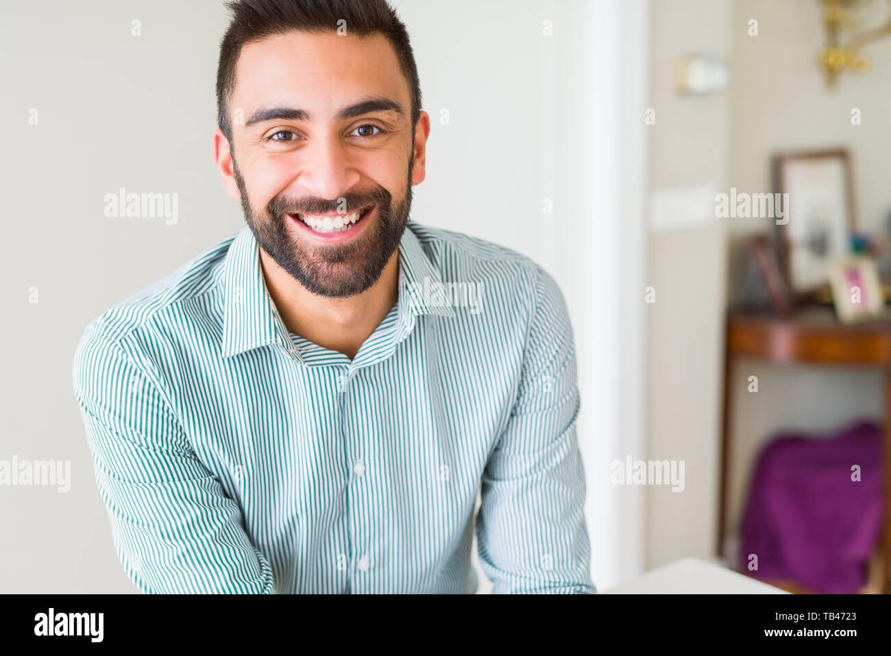 Handsome man smiling cheerful with a big smile on face showing teeth ...