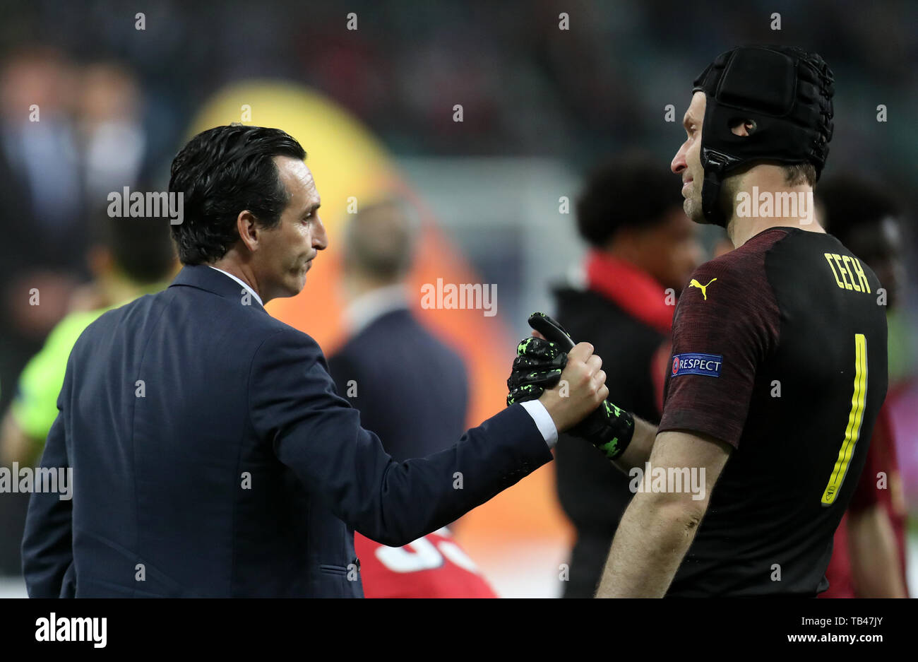 Arsenal manager Unai Emery consoles Petr Cech after the UEFA Europa ...