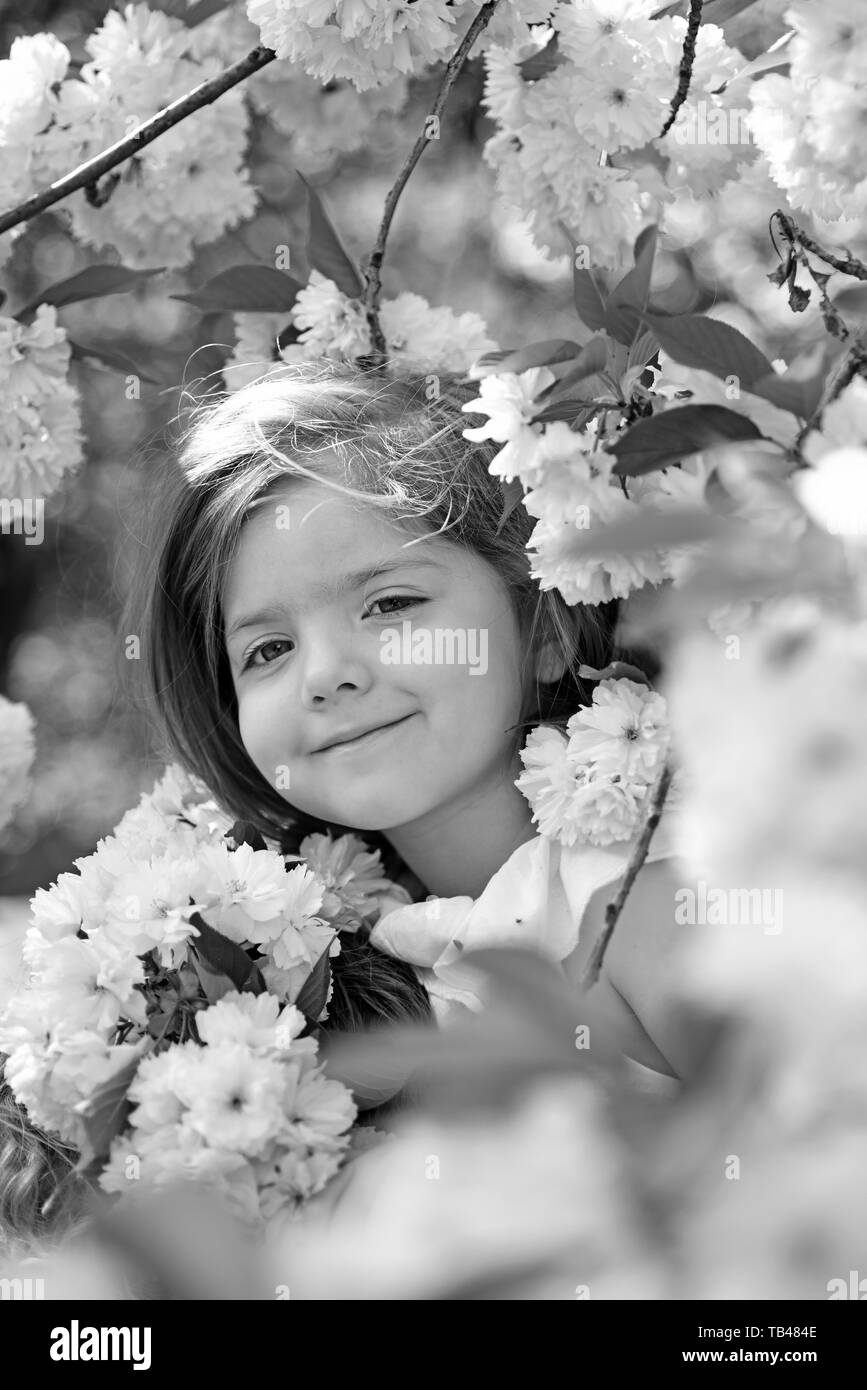 Little girl in sunny spring. Summer girl fashion. Happy childhood ...