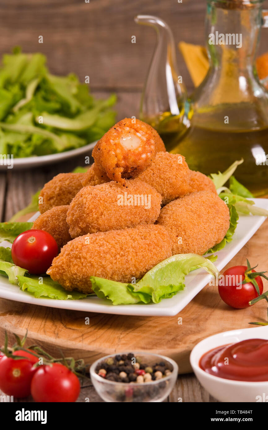 Suppli, italian fried rice balls Stock Photo - Alamy