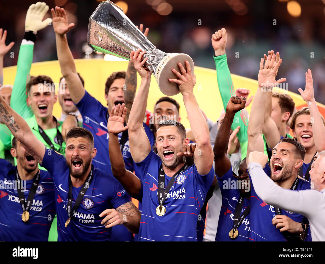 Chelsea's Gary Cahill (centre) and his team-mates celebrate with the ...
