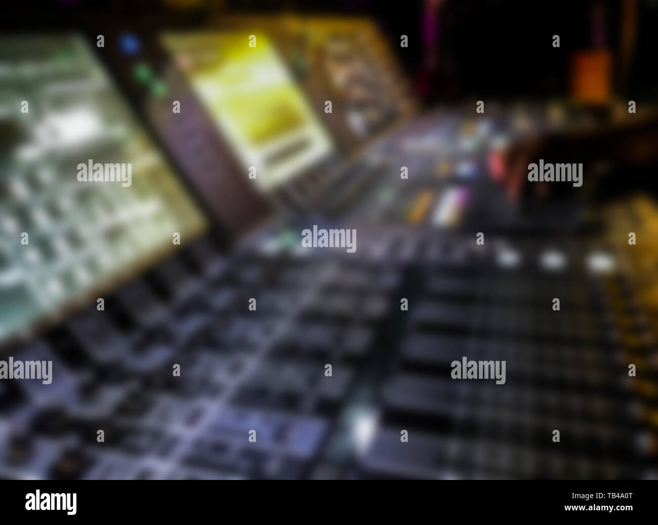 blurry Dj controles sound controller and plays mixed edm music in the ...