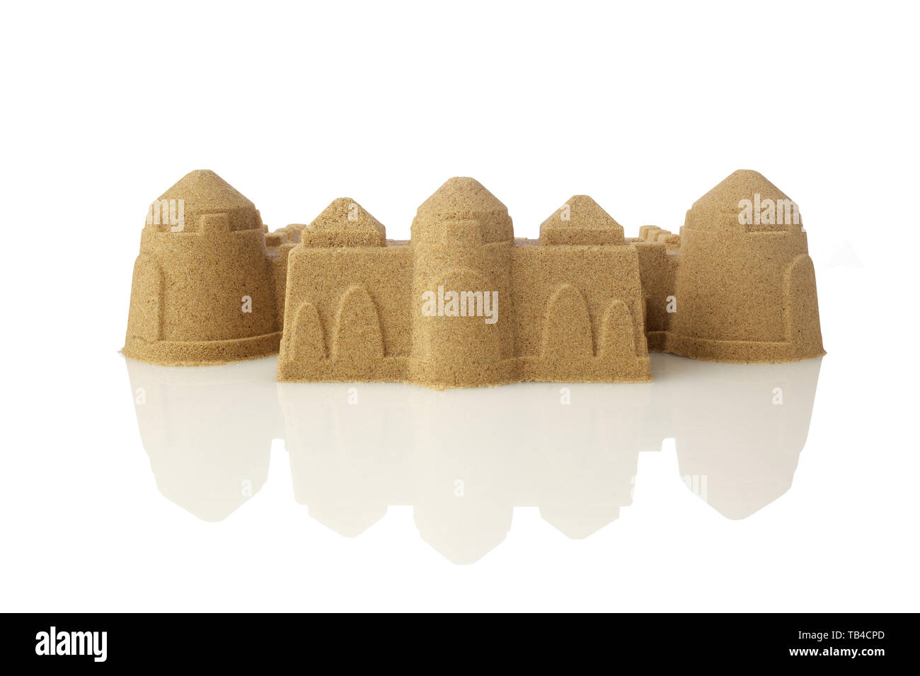 Sandcastle at the beach isolated on white background Stock Photo - Alamy