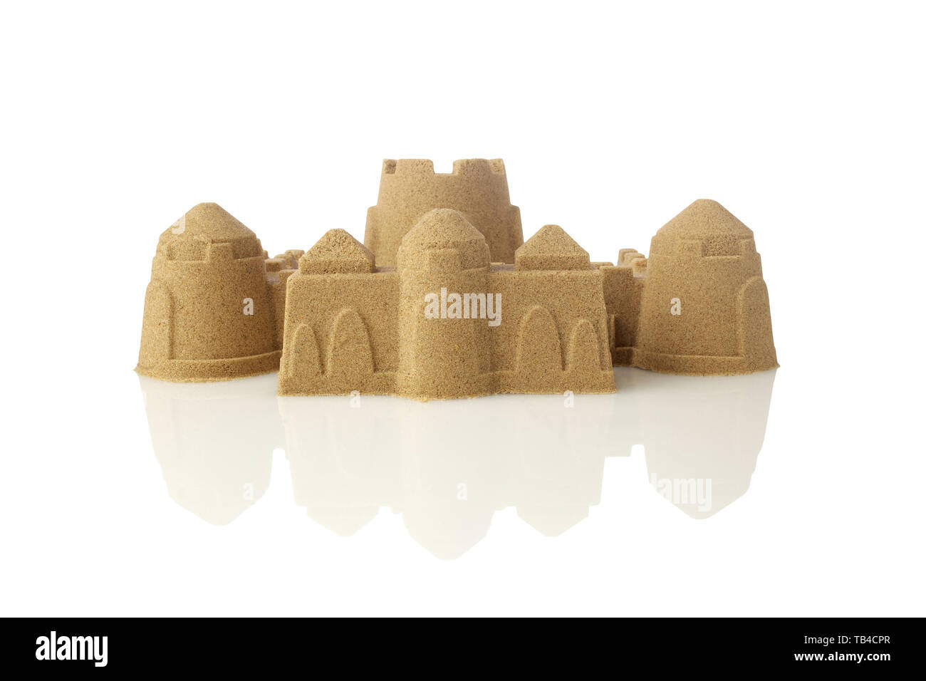Sandcastle at the beach isolated on white background Stock Photo - Alamy
