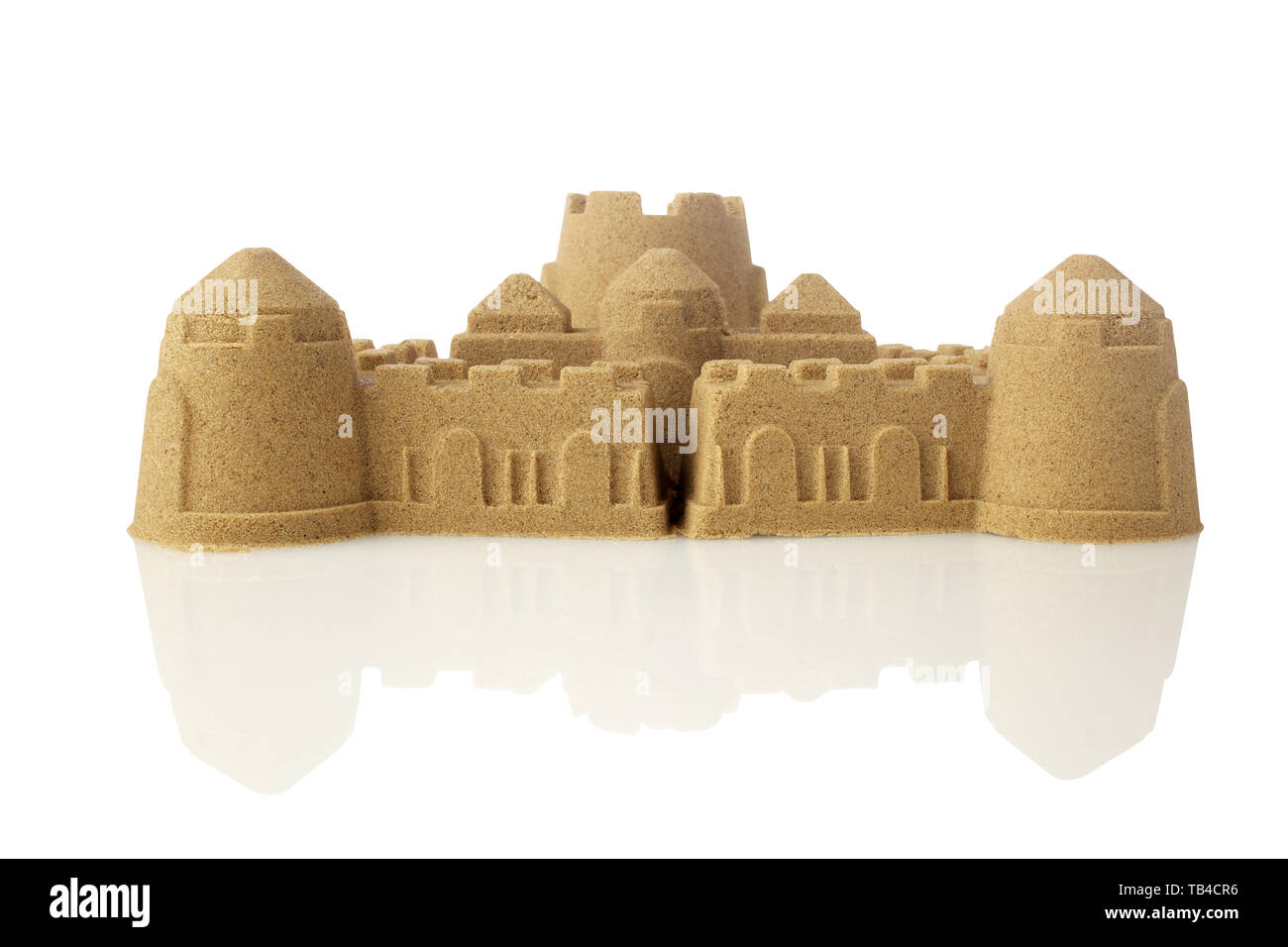 Sandcastle at the beach isolated on white background Stock Photo - Alamy