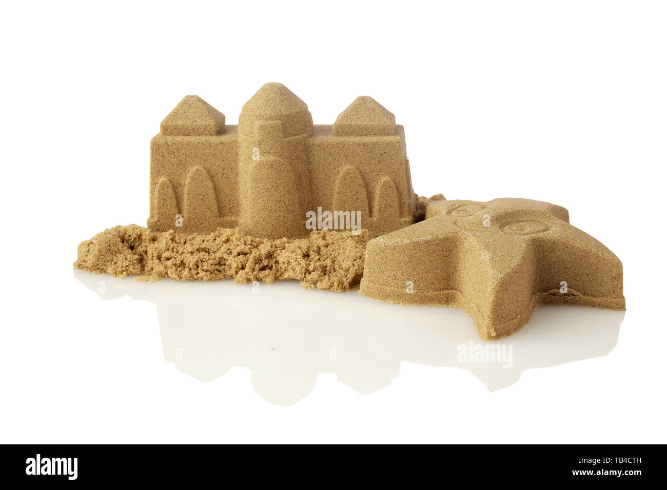 Sandcastle at the beach isolated on white background Stock Photo - Alamy