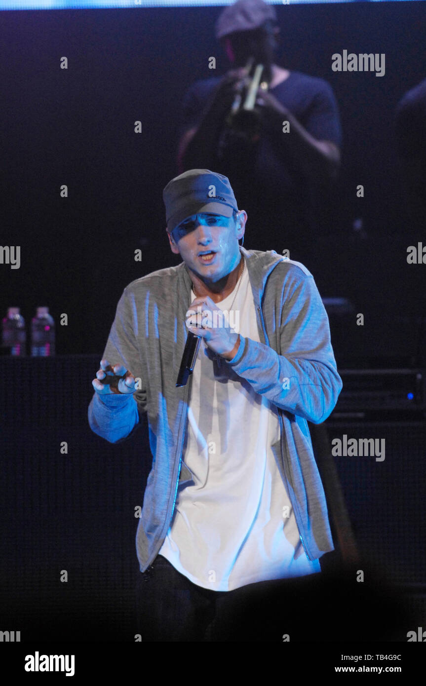Rapper Eminem performs on-stage at the launch of 'DJ Hero' at the ...