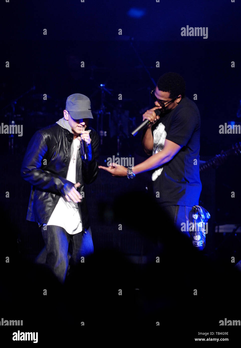 Rappers Eminem (L) and Jay-Z performs on-stage at the launch of 'DJ ...