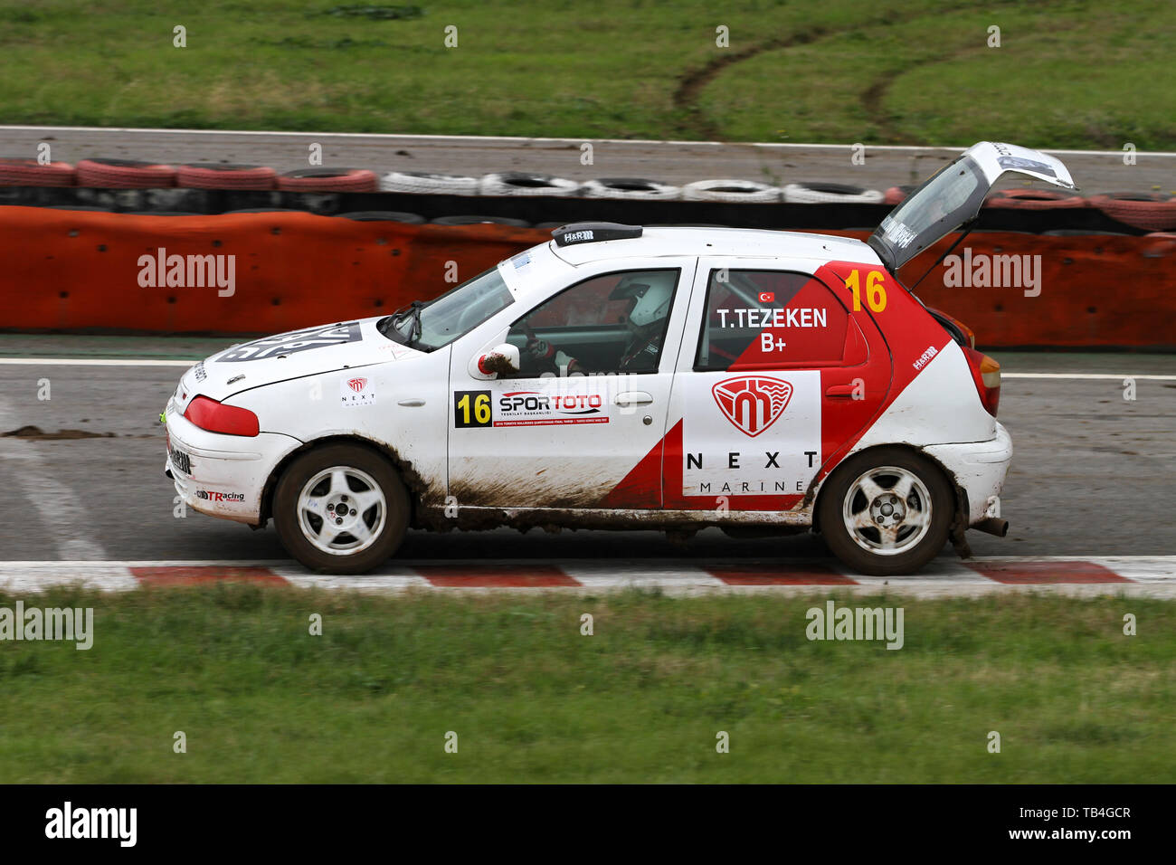 ISTANBUL, TURKEY - DECEMBER 16, 2018: Tolga Tezeken drives Fiat Palio ...