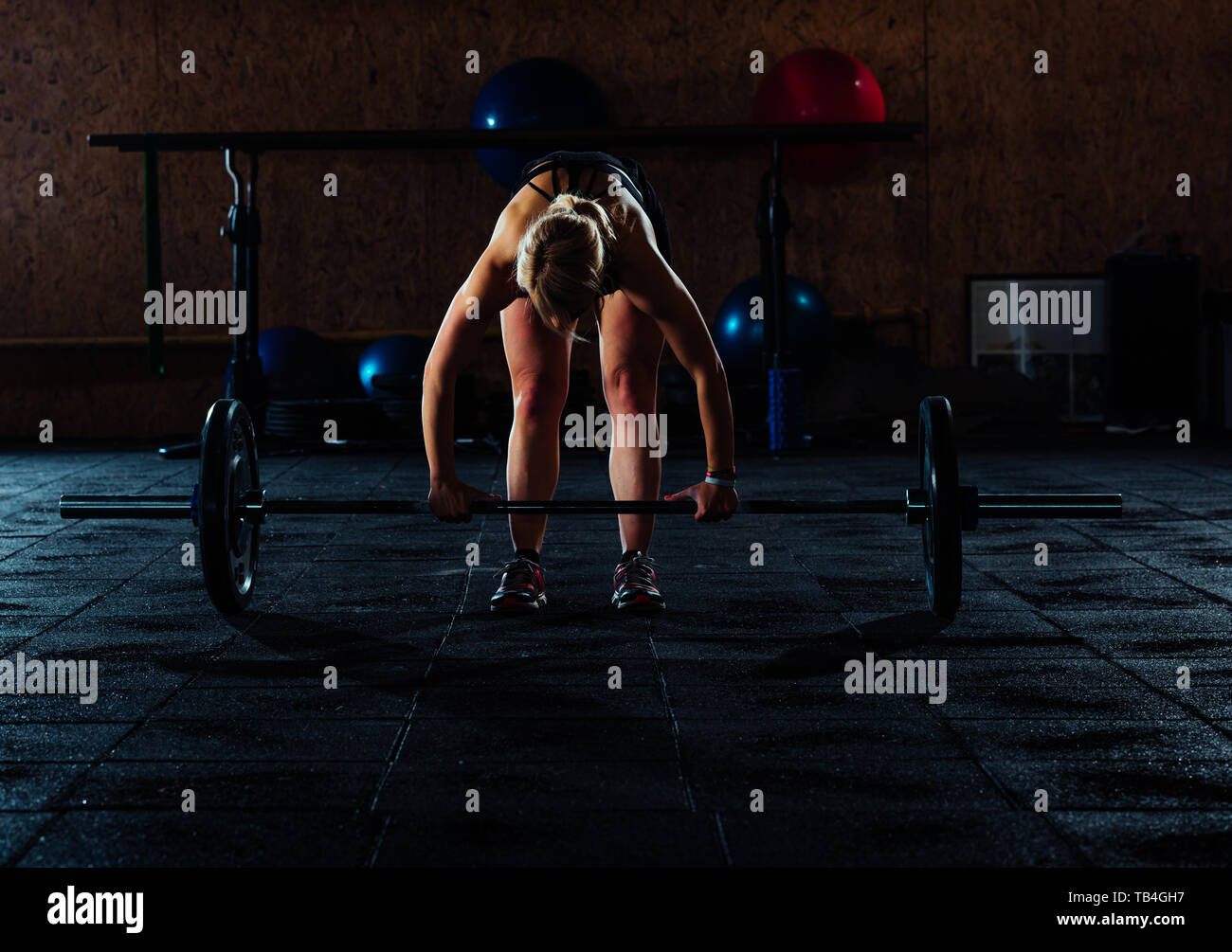 Healthy girl workout in the gym Stock Photo - Alamy