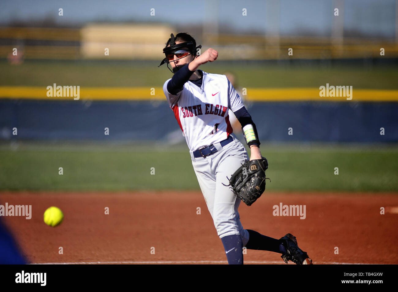 Pitcher in the circle for delivering a pitch to a waiting North hitter ...