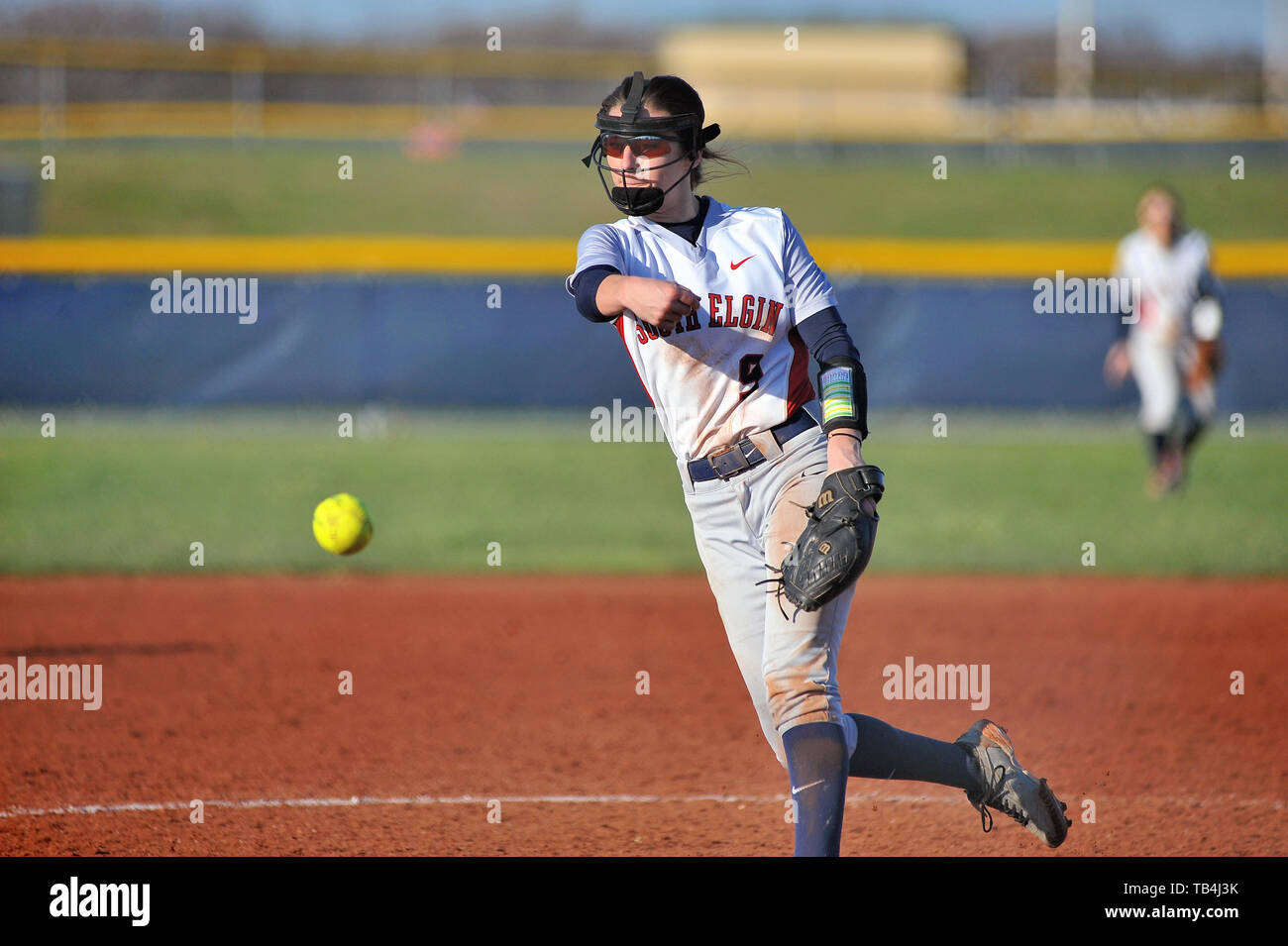 Pitcher in the circle for delivering a pitch to a waiting North hitter ...