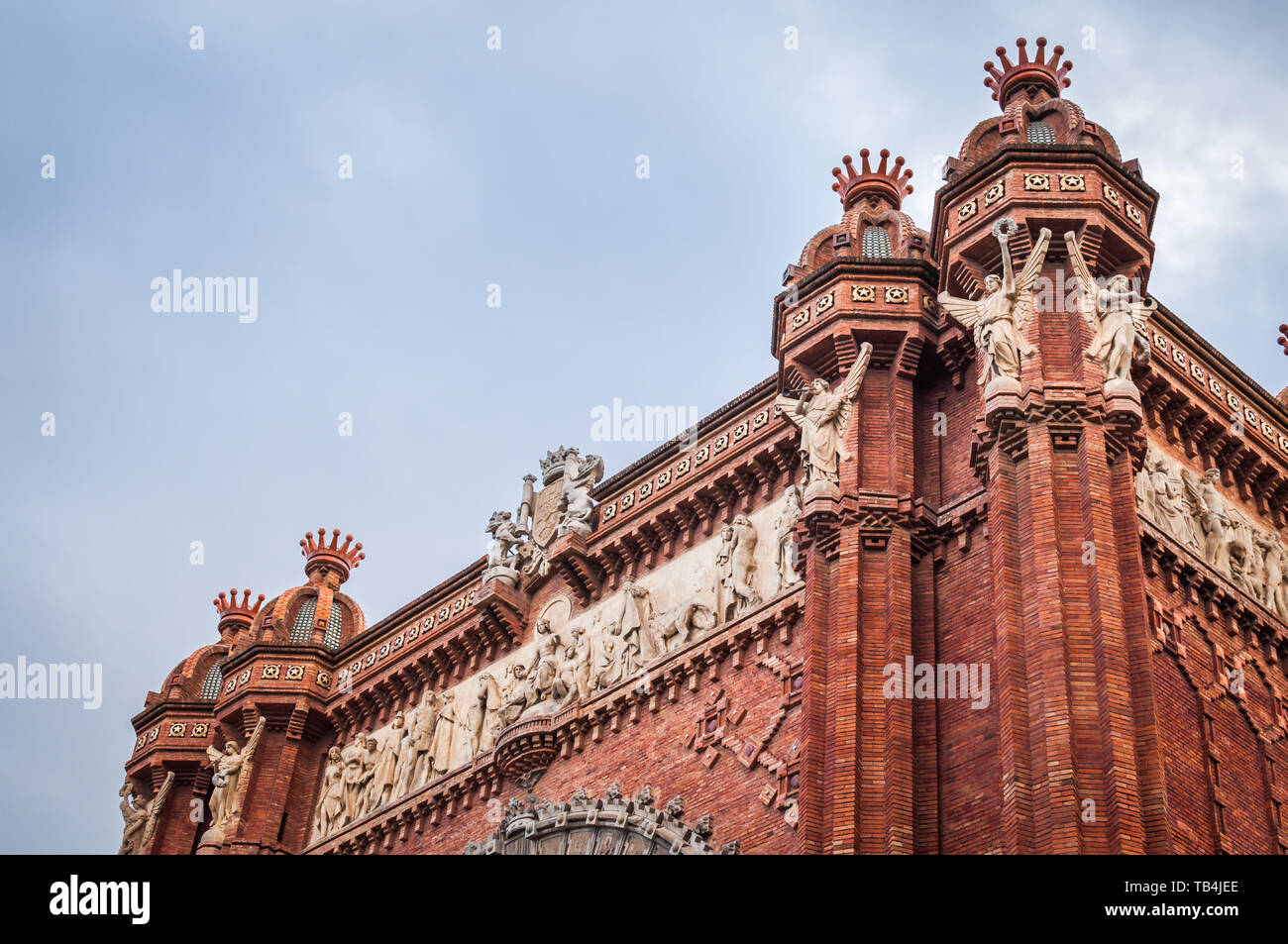 Architectural close-up of the top of the monumental red brick Arch of ...