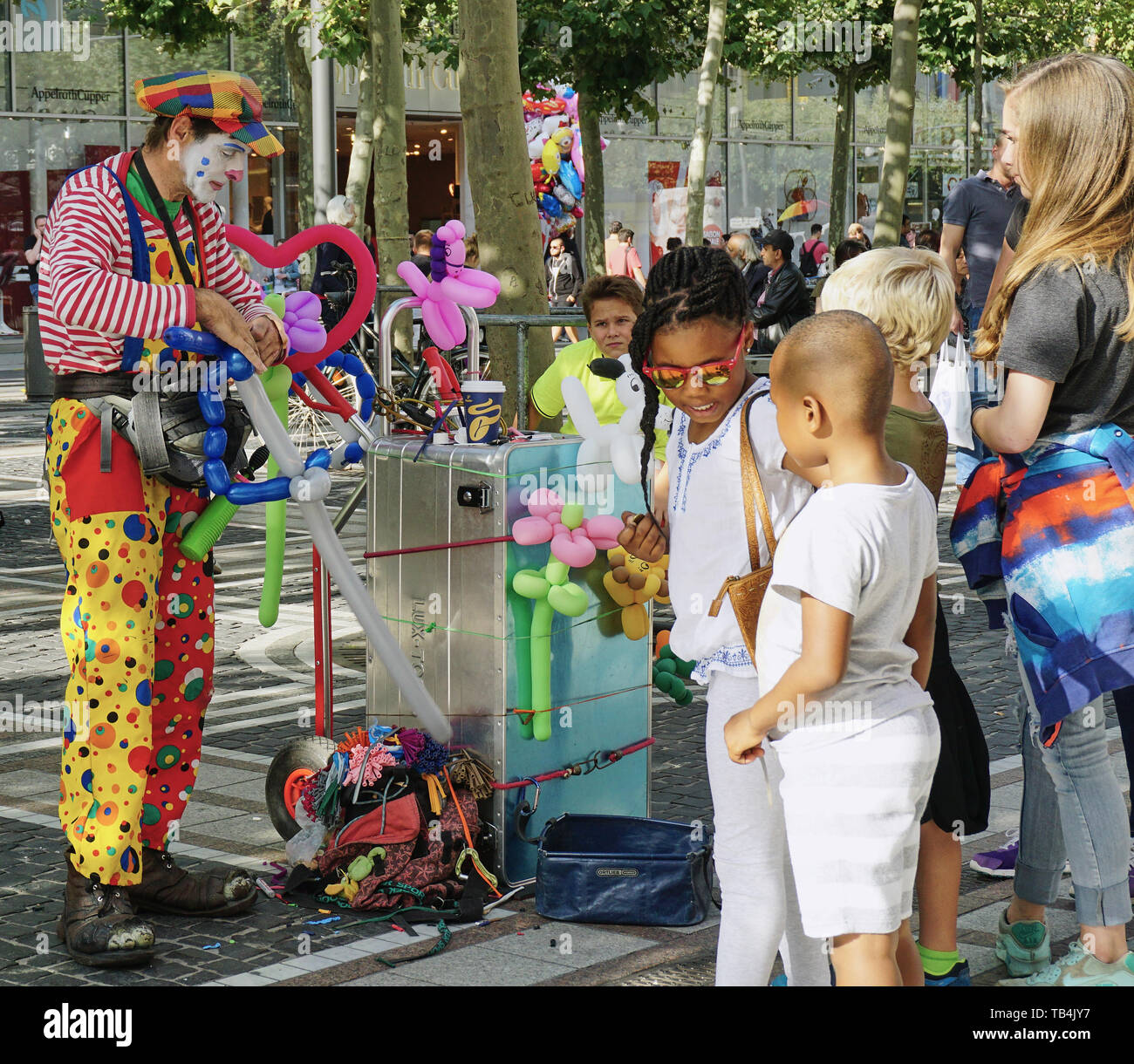 Colorful Friendly Clown Balloon Artist Entertains Children Stock Photo ...