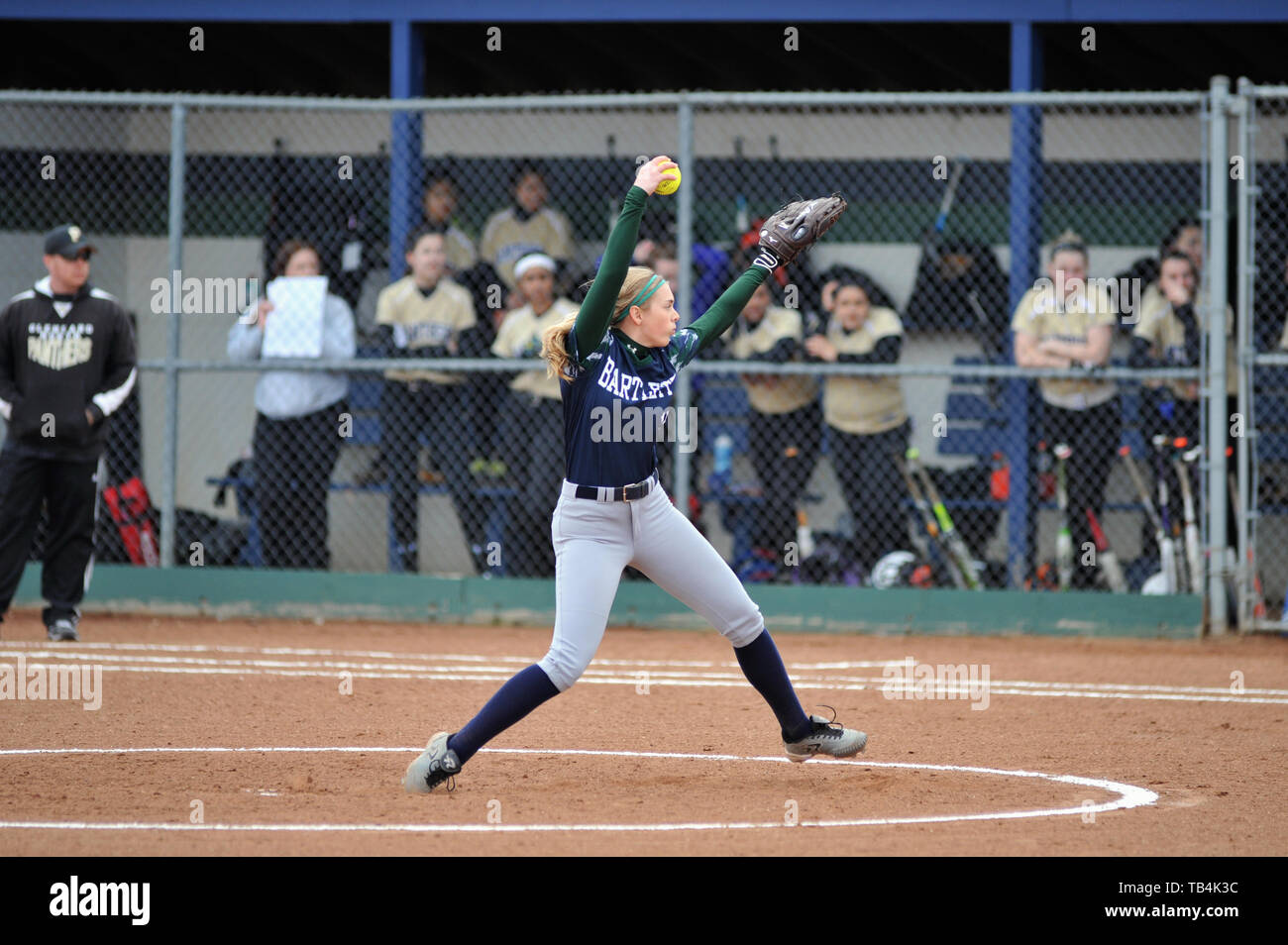 Pitcher in the circle for delivering a pitch to a waiting North hitter ...